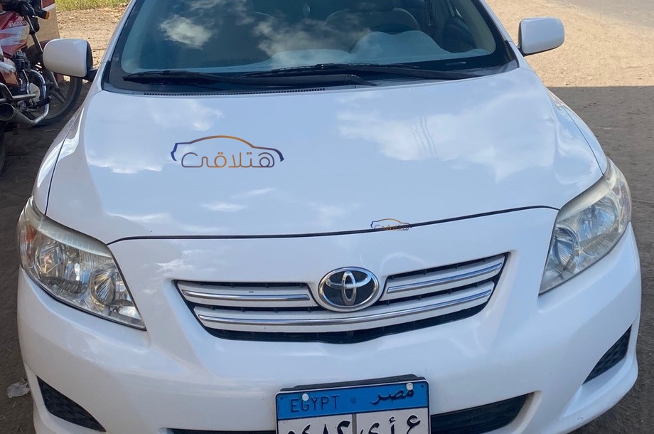 Corolla Toyota 2010 El Mahalla White 6713236 - Car for sale : Hatla2ee