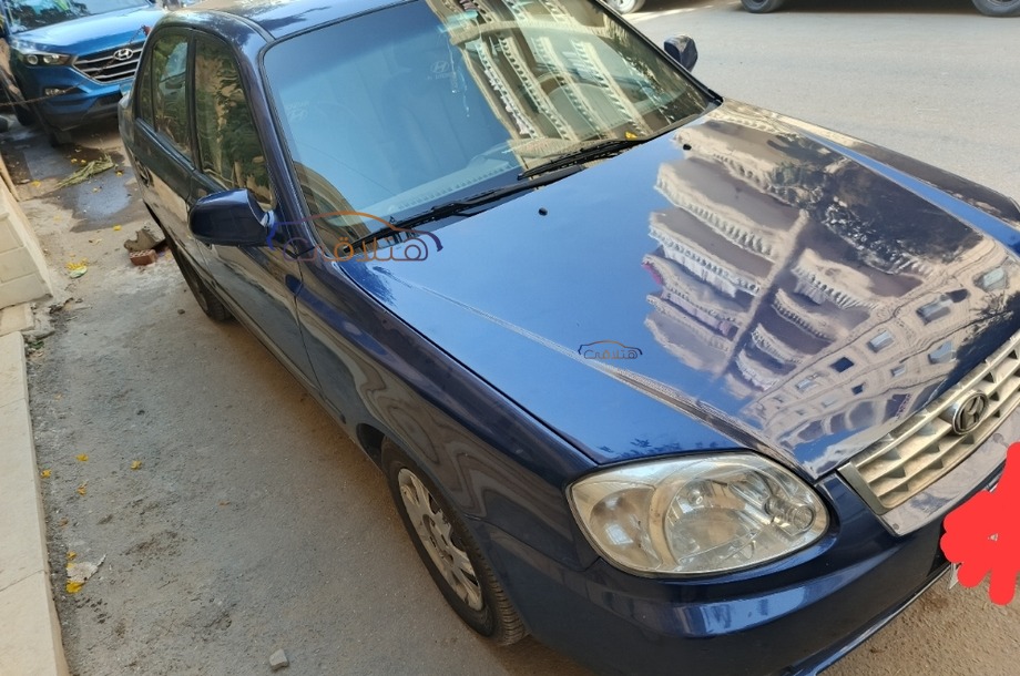 Verna Hyundai 2004 Giza Blue 6728443 - Car for sale : Hatla2ee