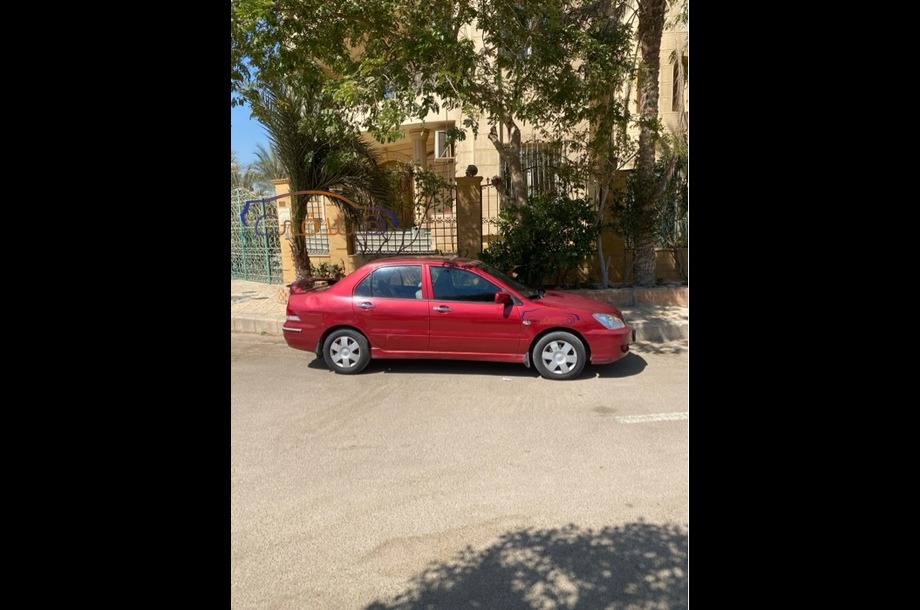 Lancer Puma Mitsubishi 2009 Tagamo3 - New Cairo Red 6732758 - Car for ...