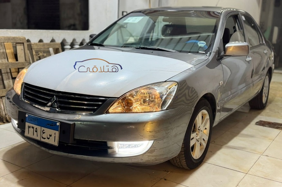 Lancer Puma Mitsubishi 2013 Cairo Silver 6736411 - Car for sale : Hatla2ee