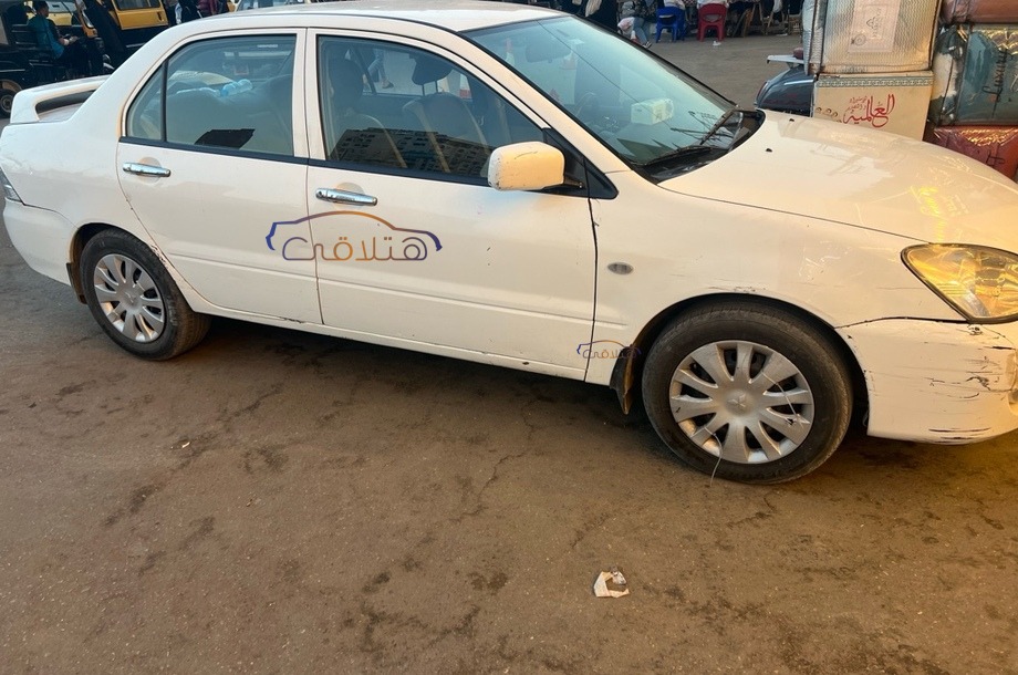Lancer Puma Mitsubishi 2014 El Mahalla White 6737642 - Car for sale ...