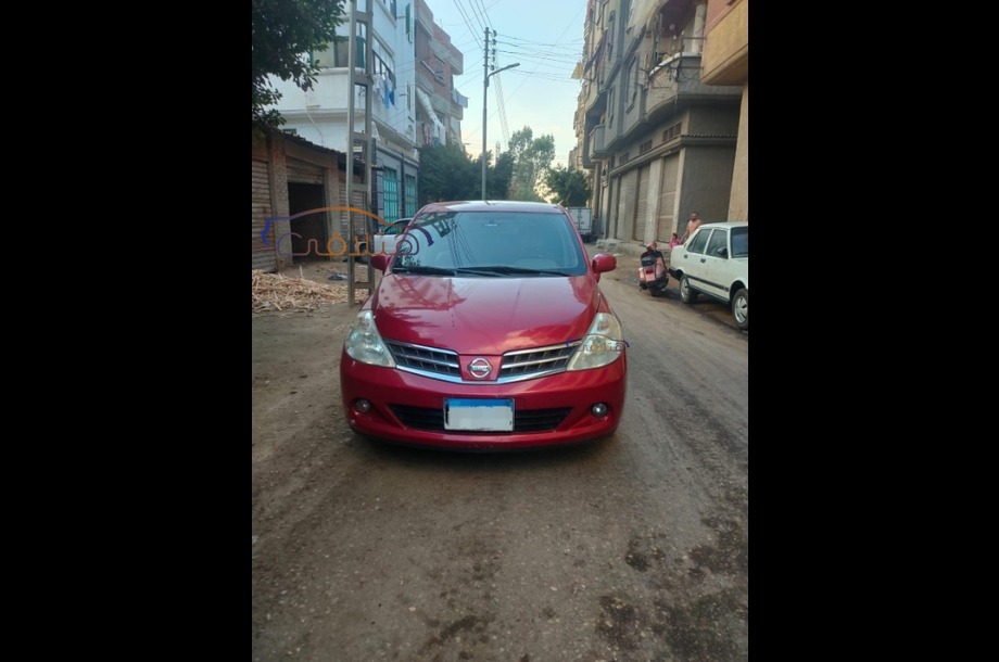 Tiida Nissan 2010 Damietta Red 6739726 - Car for sale : Hatla2ee