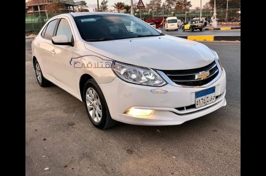 Optra Chevrolet 2016 Agamy White 6746752 - Car for sale : Hatla2ee