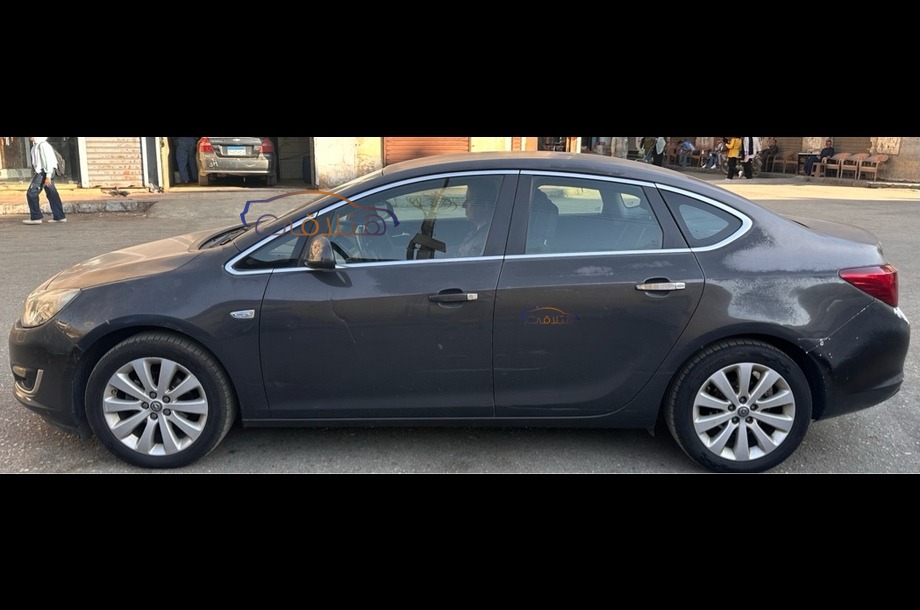 Astra Opel 2016 Qena Dark grey 6747373 - Car for sale : Hatla2ee