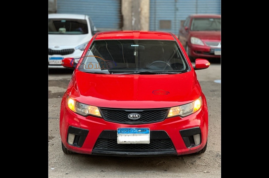 Cerato Koup Kia 2010 Heliopolis Red 6752045 - Car for sale : Hatla2ee