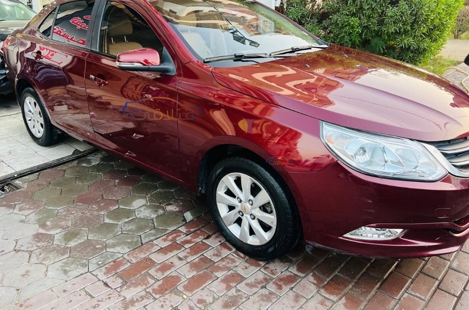 Optra Chevrolet 2022 6 October Dark red 6759053 - Car for sale : Hatla2ee