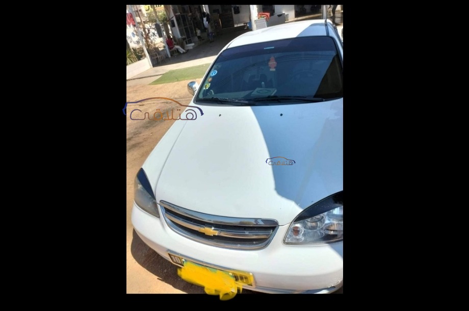 Optra Chevrolet 2014 Minya Al Qamh White 6760045 - Car for sale : Hatla2ee