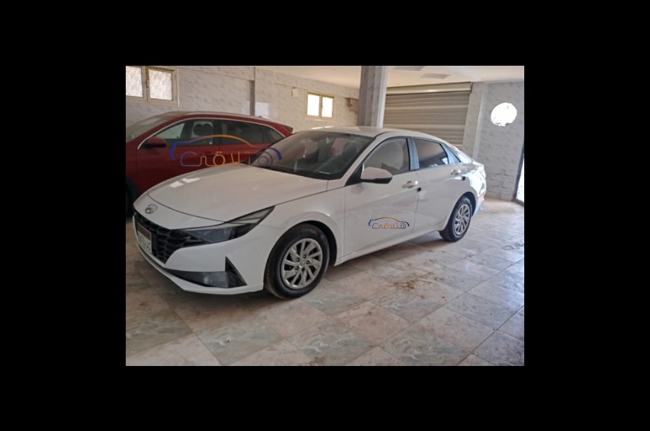 Elantra CN7 Hyundai 2021 El Minya White 6767878 - Car for sale : Hatla2ee