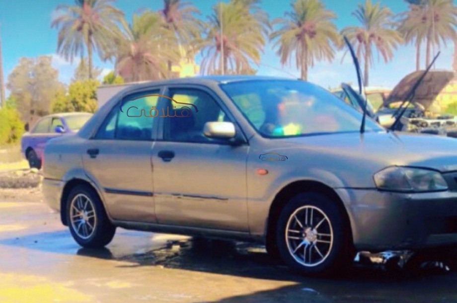 Familia Mazda 2000 Cairo Gold 6789509 - Car for sale : Hatla2ee