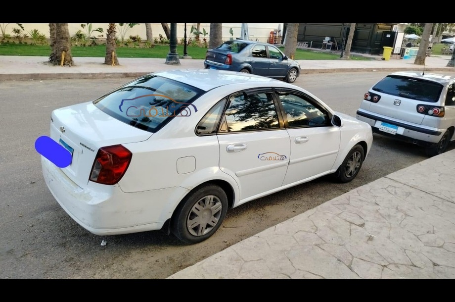 Optra Chevrolet 2014 Alexandria White 6790490 - Car for sale : Hatla2ee