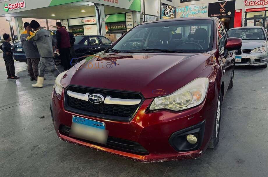Impreza Subaru 2012 Sheraton Red 6791309 - Car for sale : Hatla2ee