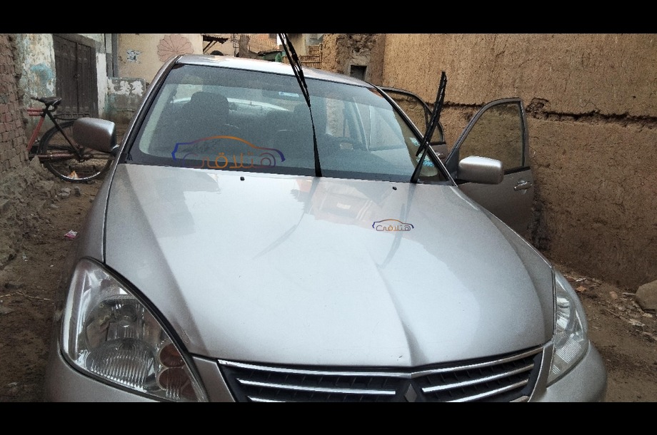 Lancer Puma Mitsubishi 2014 Tanta Silver 6792029 - Car for sale : Hatla2ee