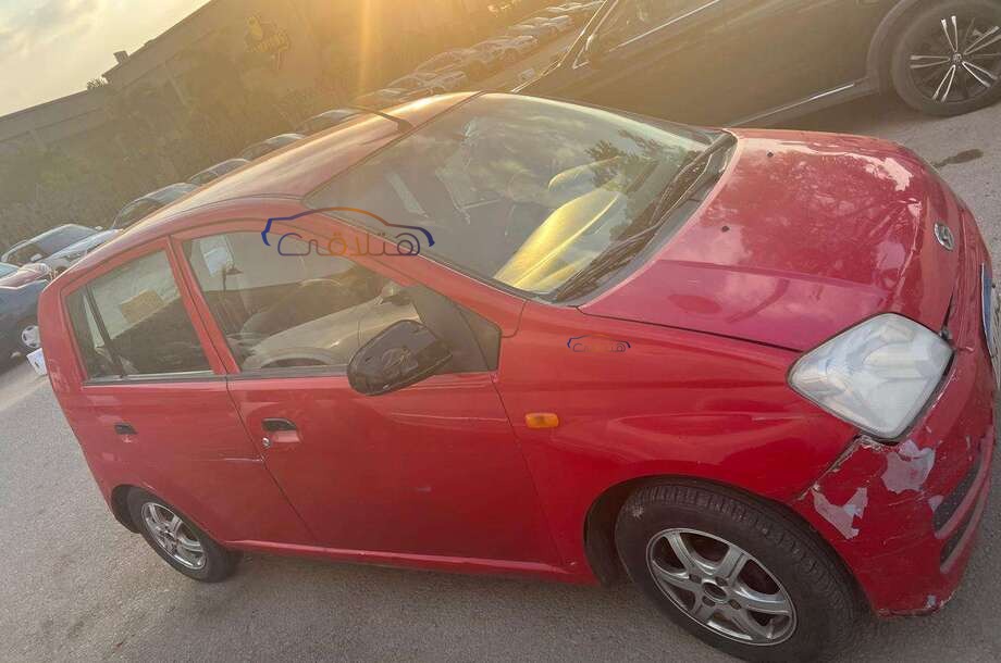Charade Daihatsu 2007 Heliopolis Red 6792323 - Car for sale : Hatla2ee