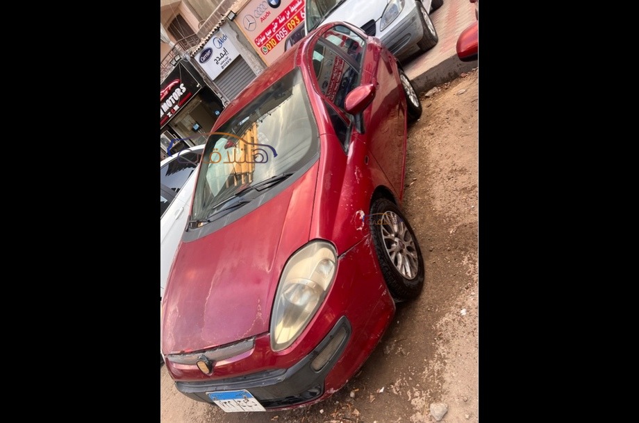 Punto evo Fiat 2011 Cairo Red 6798473 - Car for sale : Hatla2ee