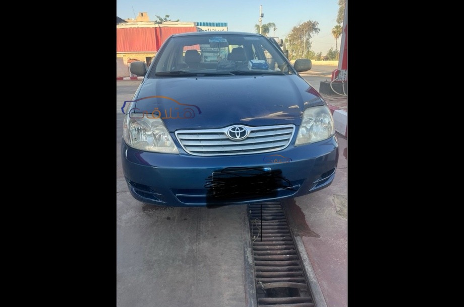 Corolla Toyota 2003 El Mahalla Dark blue 6800248 - Car for sale : Hatla2ee