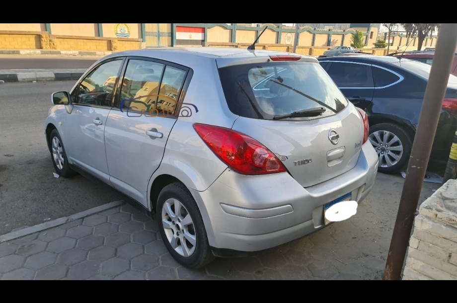 Tiida Nissan 2013 Obour City Silver 6801734 - Car for sale : Hatla2ee