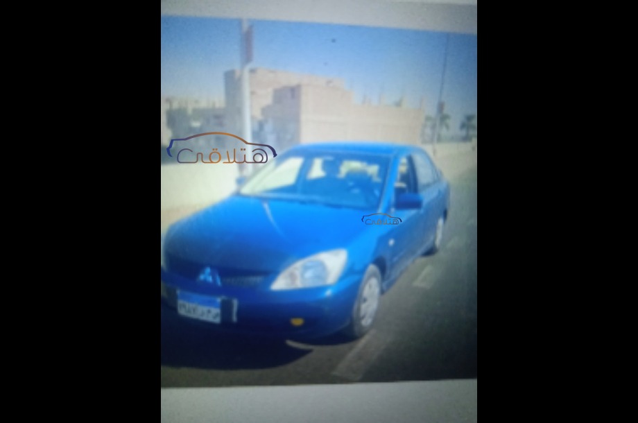 Lancer Puma Mitsubishi 2006 Qena Blue 6804349 - Car for sale : Hatla2ee