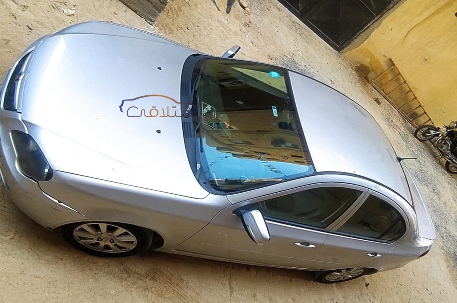 Persona Proton 2012 Red Sea Silver 6815947 - Car for sale : Hatla2ee