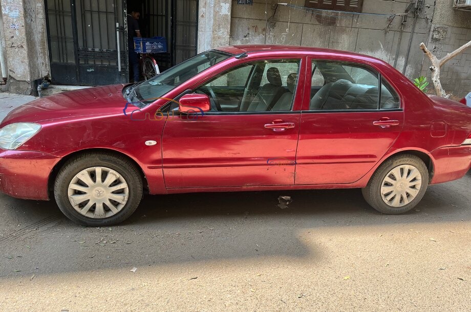 Lancer Puma Mitsubishi Cairo Dark red 6817408 - Car for sale : Hatla2ee