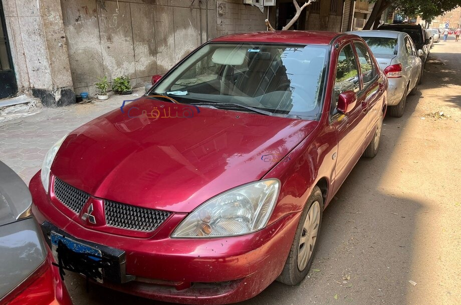Lancer Puma Mitsubishi Cairo Dark red 6817408 - Car for sale : Hatla2ee