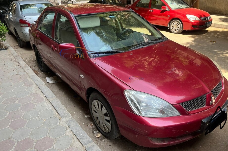 Lancer Puma Mitsubishi Cairo Dark red 6817408 - Car for sale : Hatla2ee