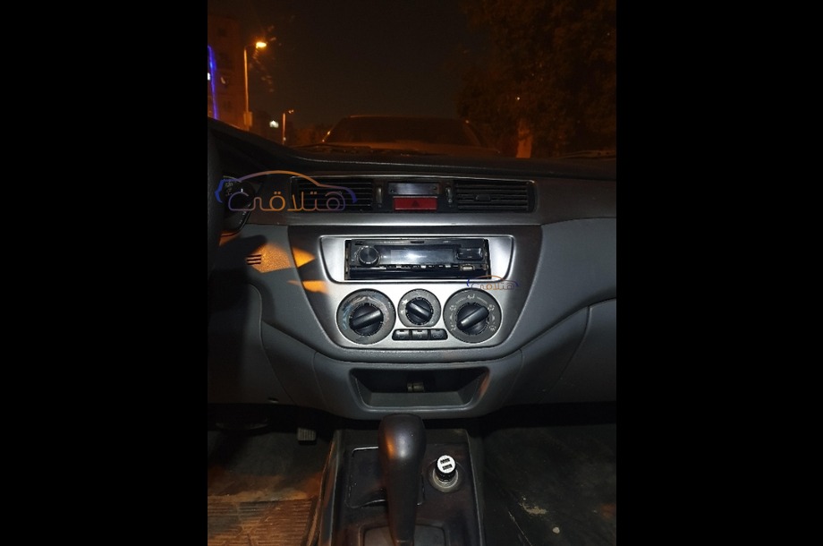 Lancer Puma Mitsubishi 2012 Cairo White 6820244 - Car for sale : Hatla2ee