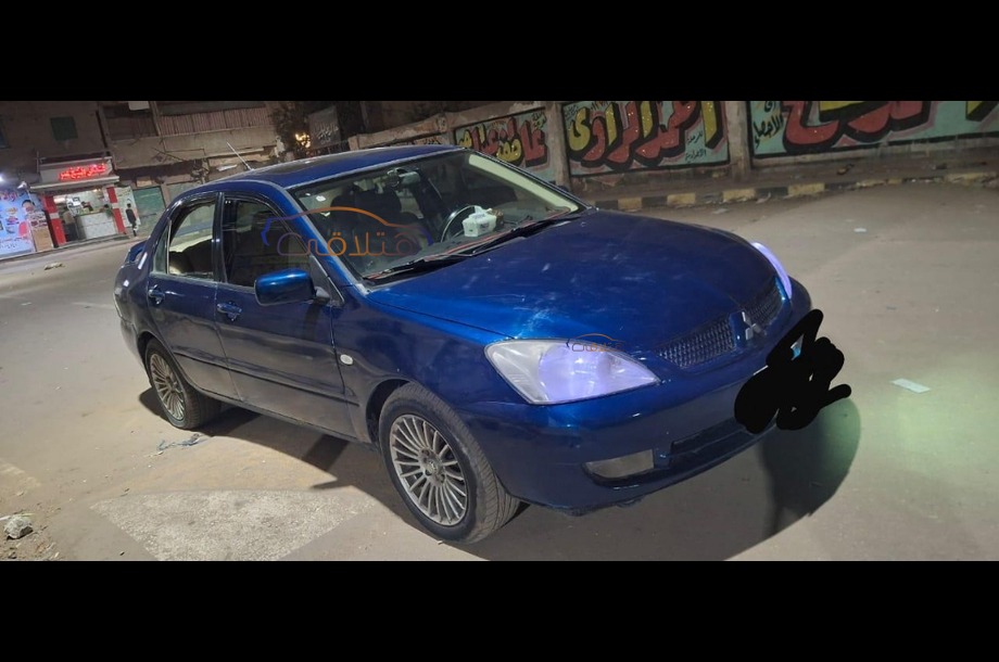 Lancer Puma Mitsubishi 2006 Cairo Blue 6820930 - Car for sale : Hatla2ee
