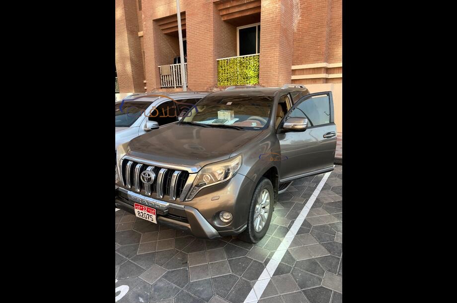 Prado Toyota 2016 6 October Gold 6827579 - Car for sale : Hatla2ee