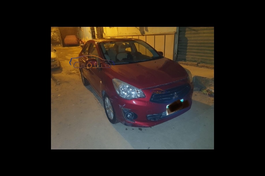 Attrage Mitsubishi 2015 Suez Dark red 6828566 - Car for sale : Hatla2ee