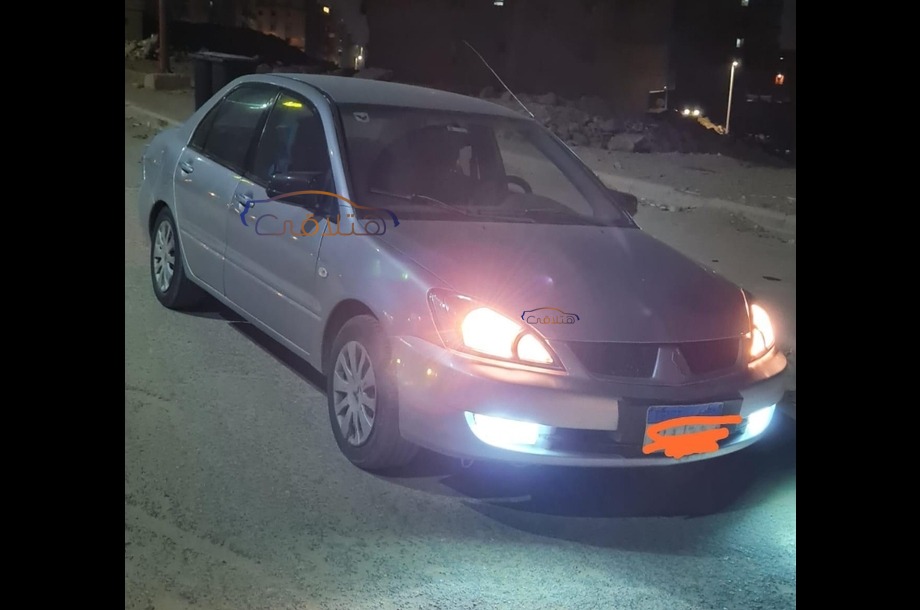 Lancer Puma Mitsubishi 2006 Helwan Silver 6830134 - Car for sale : Hatla2ee