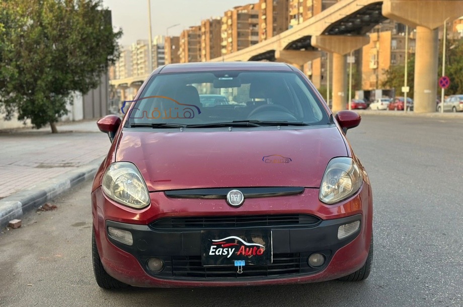Punto evo Fiat 2012 Nasr city Dark red 6832007 - Car for sale : Hatla2ee