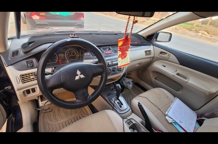 Lancer Puma Mitsubishi 2013 Helwan Blue 6841933 - Car for sale : Hatla2ee