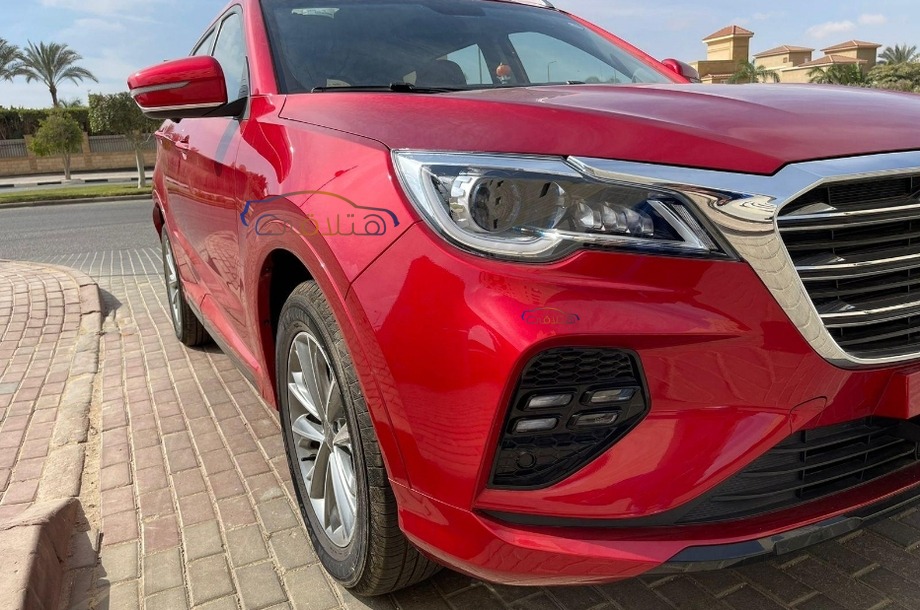 X70 Jetour 2023 Sheikh Zayed City Red 6843355 - Car for sale : Hatla2ee