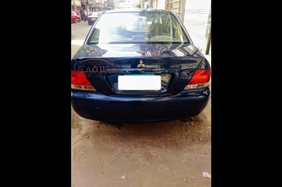 Lancer Mitsubishi 2006 Dakahlia Blue 6845062 - Car for sale : Hatla2ee