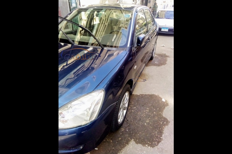 Lancer Mitsubishi 2006 Dakahlia Blue 6845062 - Car for sale : Hatla2ee