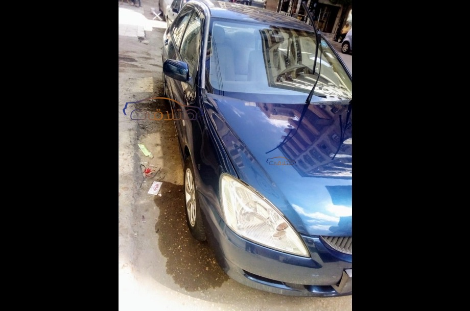 Lancer Mitsubishi 2006 Dakahlia Blue 6845062 - Car for sale : Hatla2ee