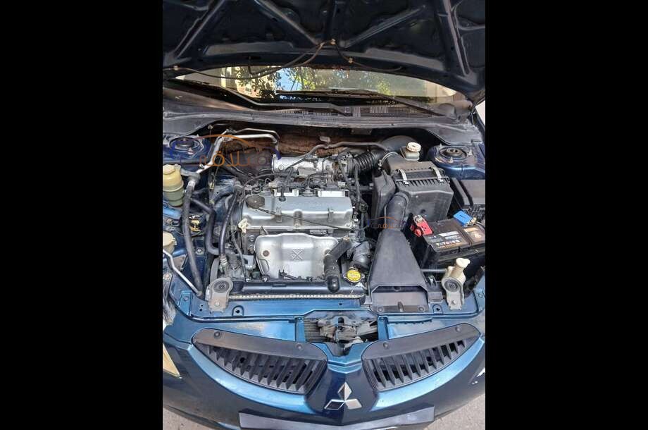 Lancer Puma Mitsubishi 2005 Asyut Blue 6845935 - Car for sale : Hatla2ee