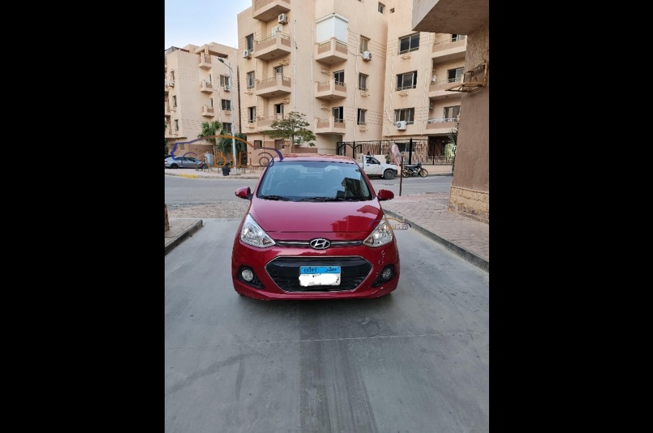 Grand i10 Hyundai 2016 6 October Dark red 6845990 - Car for sale : Hatla2ee