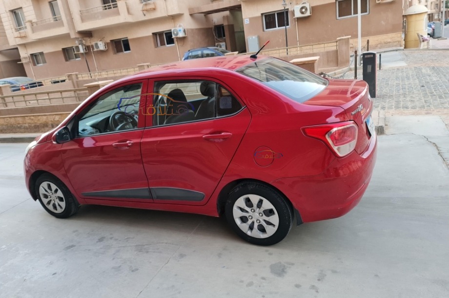 Grand i10 Hyundai 2016 6 October Dark red 6845990 - Car for sale : Hatla2ee
