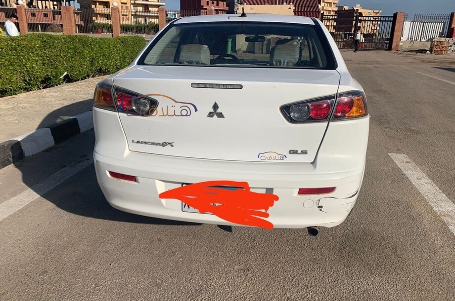 Lancer Mitsubishi 2016 6 October White 6860941 - Car for sale : Hatla2ee