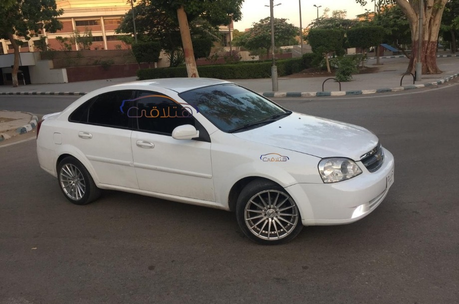 Optra Chevrolet 2014 Asyut White 6864152 - Car for sale : Hatla2ee