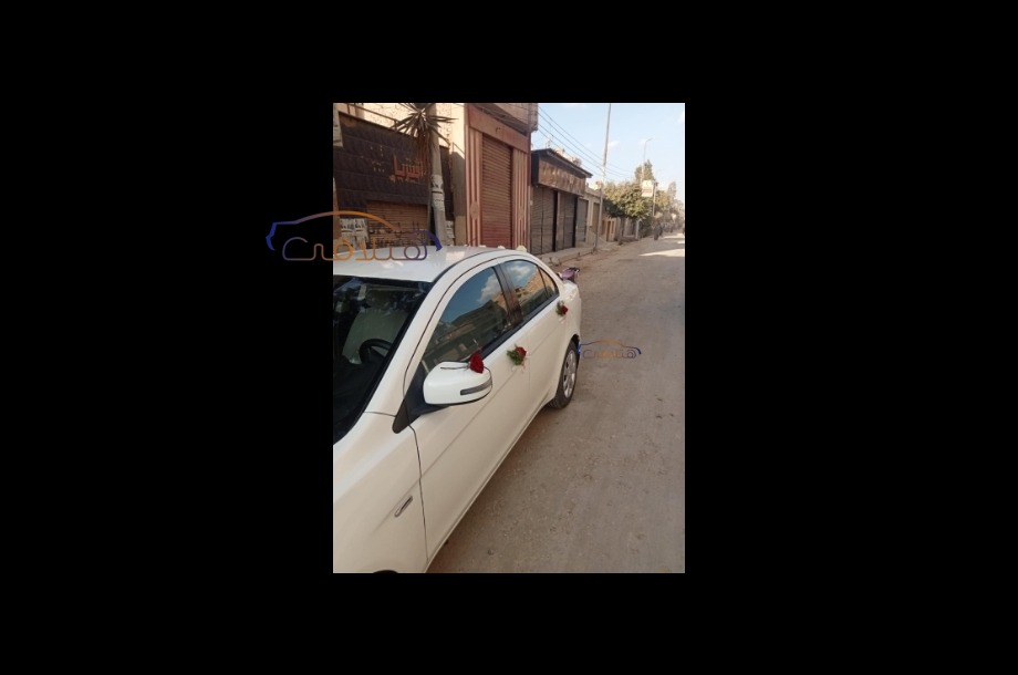 Lancer EX Shark Mitsubishi 2016 Zagazig White 6868701 - Car for sale : Hatla2ee