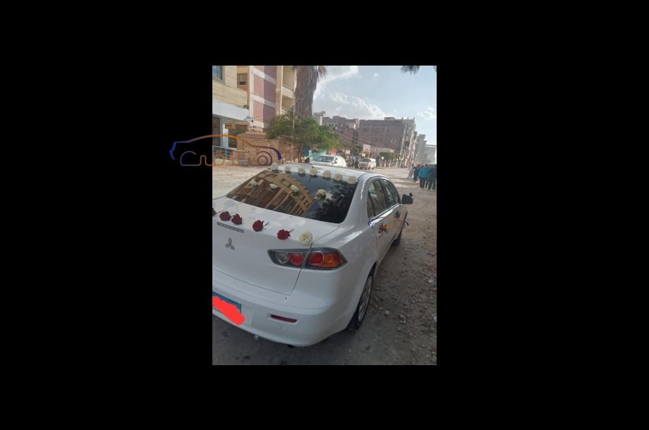Lancer EX Shark Mitsubishi 2016 Zagazig White 6868701 - Car for sale : Hatla2ee