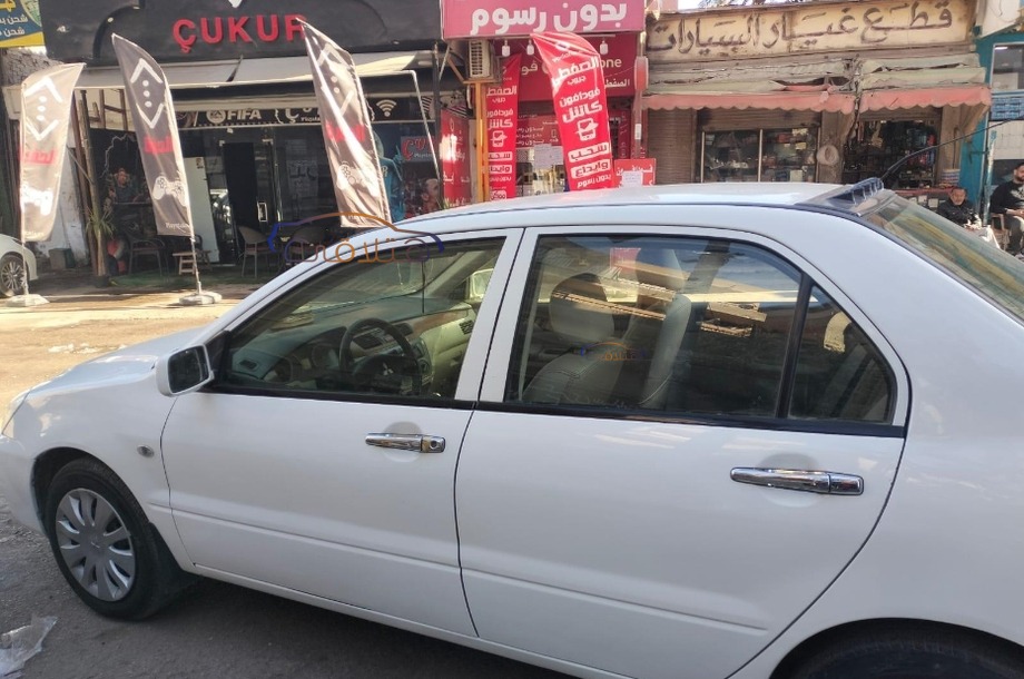 Lancer Puma Mitsubishi 2014 El Mahalla White 6869354 - Car for sale ...
