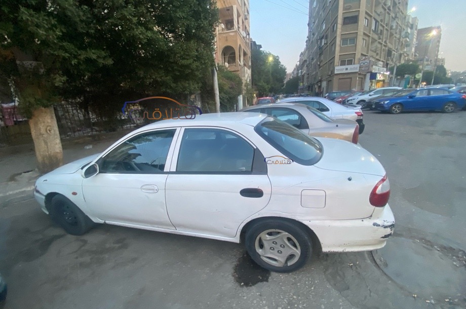 Sephia Kia 1999 Heliopolis White 6869555 - Car for sale : Hatla2ee