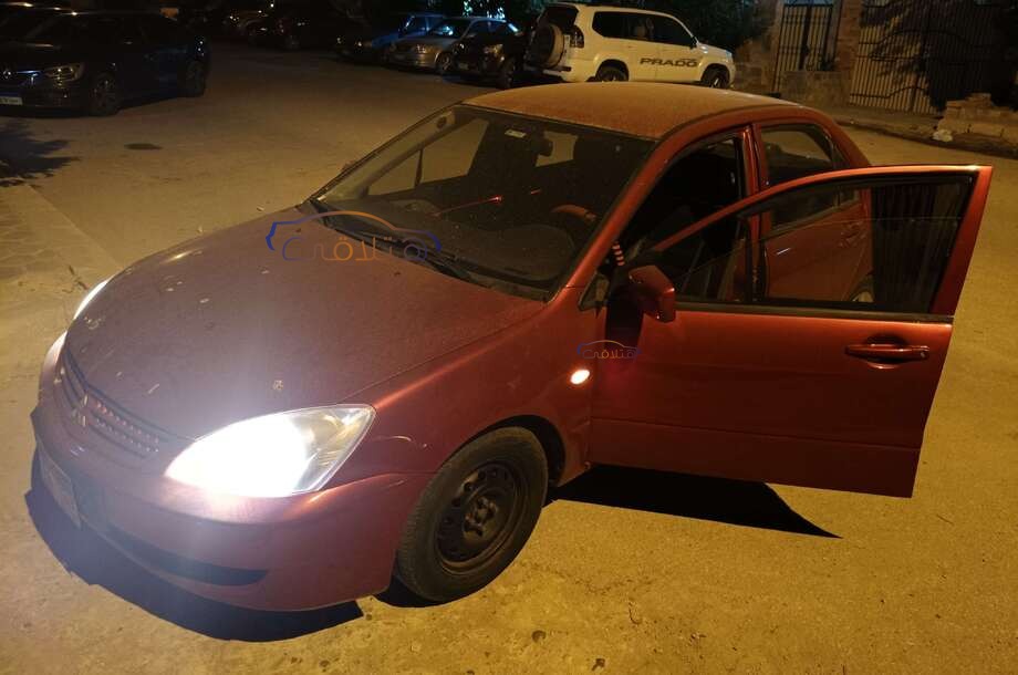 Lancer Puma Mitsubishi 2007 Madinaty Red 6870577 - Car for sale : Hatla2ee