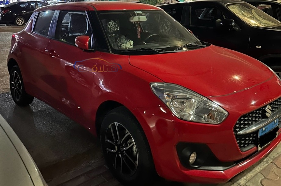 Swift Suzuki 2021 Tagamo3 - New Cairo Red 6870618 - Car for sale : Hatla2ee