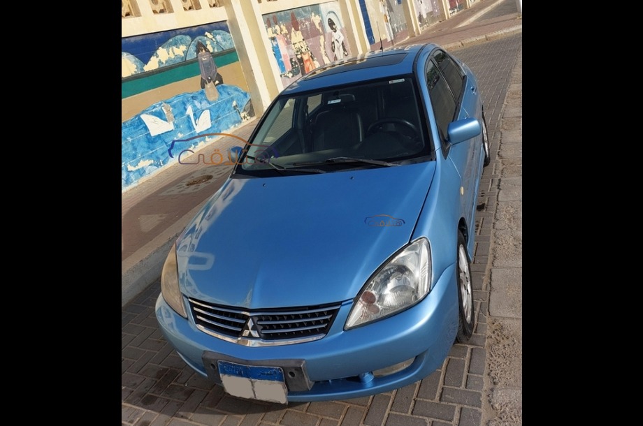Lancer Puma Mitsubishi 2004 6 October Cyan 6870724 - Car for sale ...