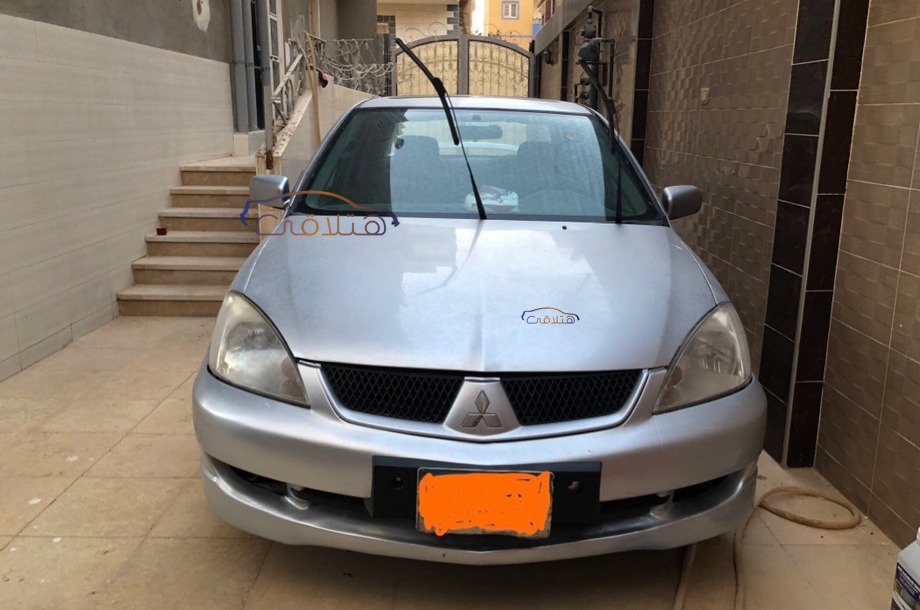 Lancer Puma Mitsubishi 2007 Suez Silver 6871661 - Car for sale : Hatla2ee