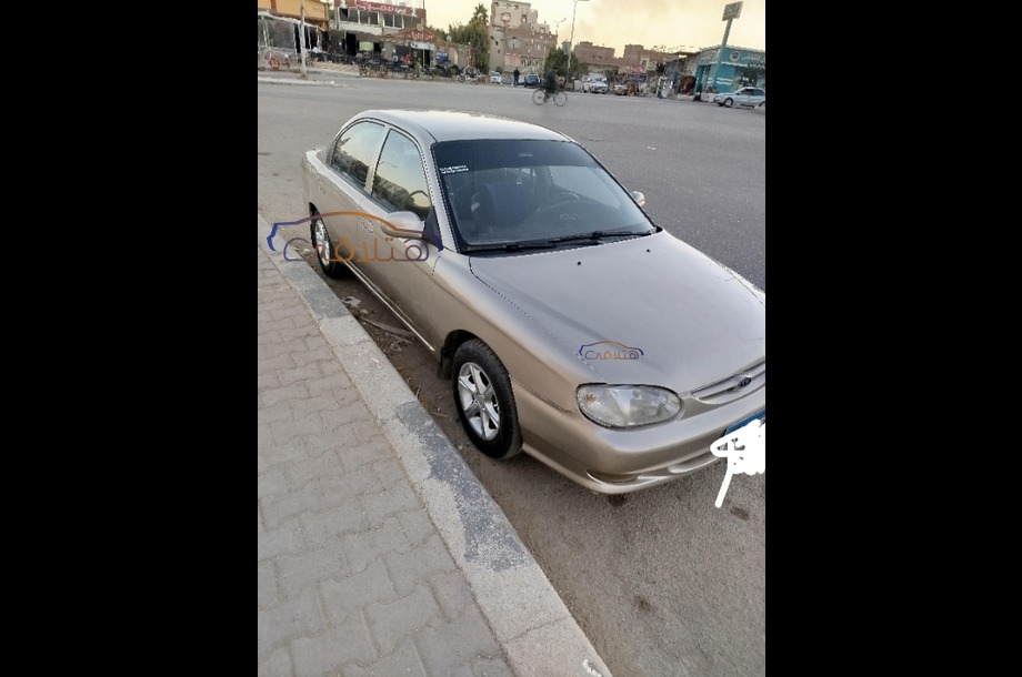 Sephia Kia 1999 Suez Gold 6874556 - Car for sale : Hatla2ee